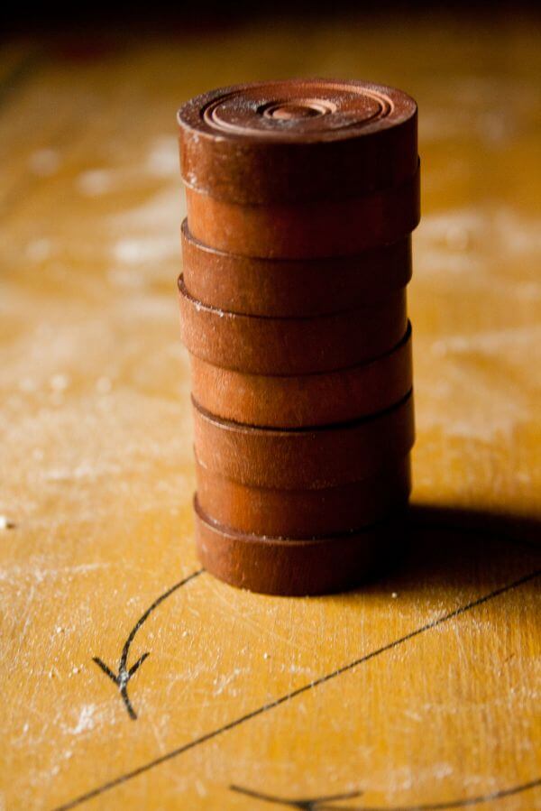 Free photo "Stack Of White Carrom Coins"