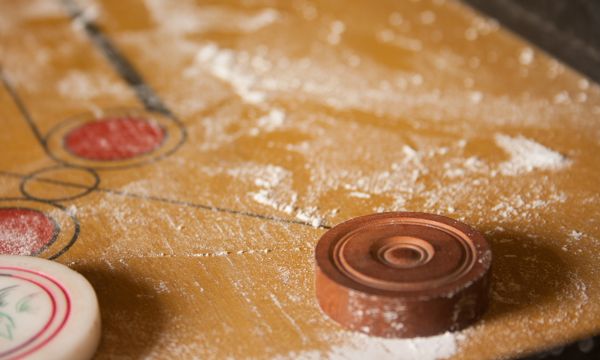 Free photo "White Carrom Coin Standing"